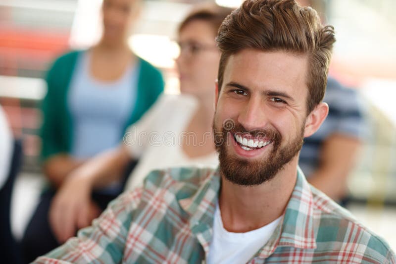 I Love the Easy-going Work Environment. a Male Designer Smiling at the ...