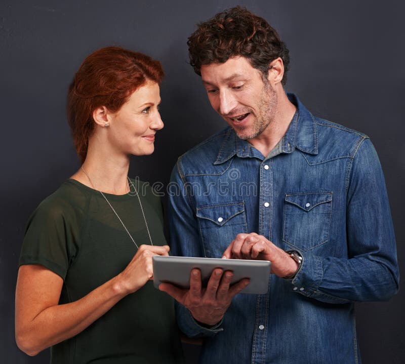 I Love How Smart he is...a Handsome Man Holding a Digital Tablet and ...