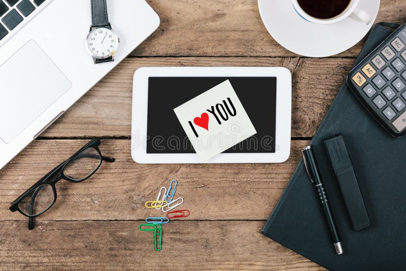 I Love You Text on Tablet Computer, Office Desk with Computer Te Stock ...