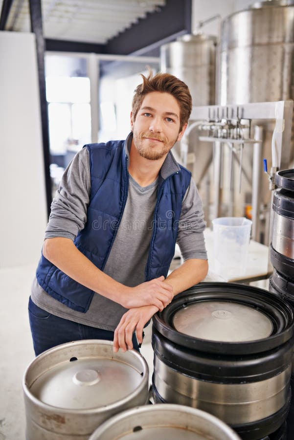 I Make a Fine Beer. Portrait of a Man Working in a Microbrewery. Stock ...