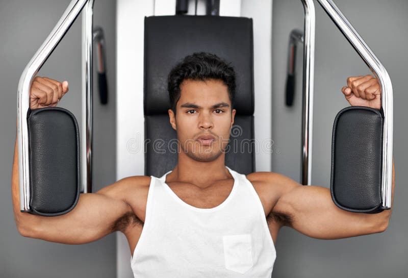 I Make Working Out Look Like a Breeze. an Athletic Young Man Working ... I Make Working Out Look Like a Breeze. an Athletic Young Man Working ...