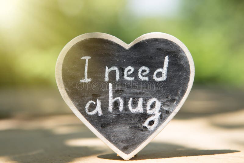 I Need a Hug Hand Drawing Phrase on a Heart, Sharing a Hug Concept ...