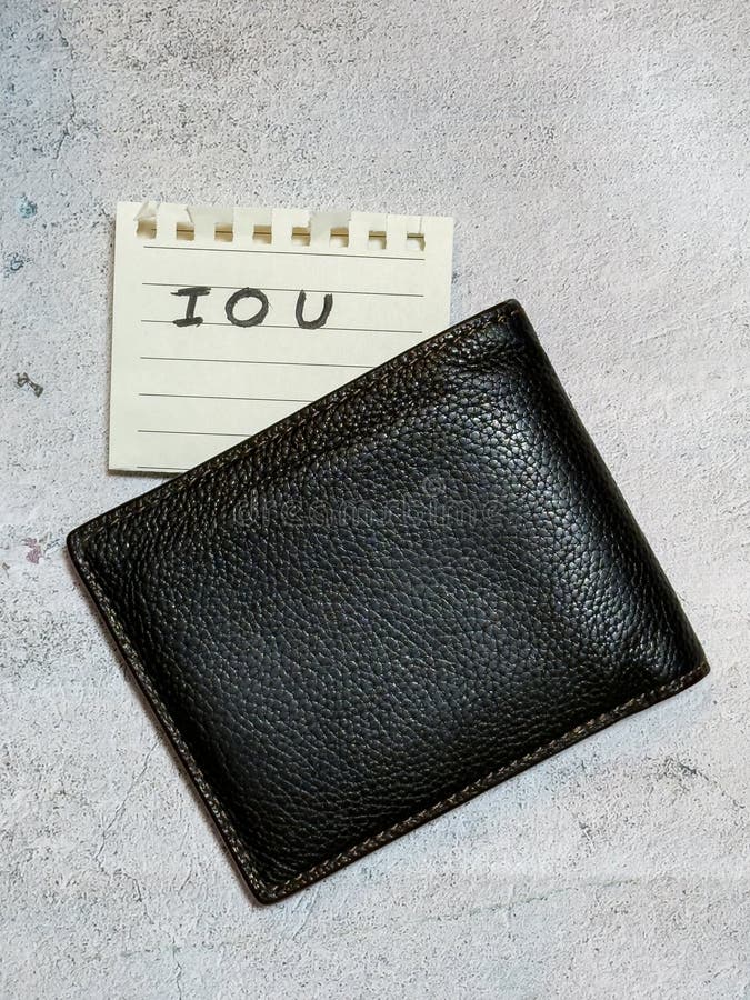 An I Owe You Note Sticking Out of a Wallet. Stock Photo - Image of ...