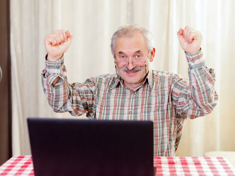 Old Man Celebrating with Laptop Stock Photo - Image of browsing ...