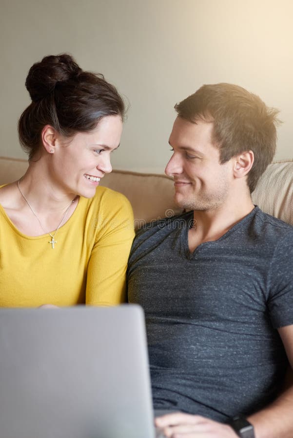 I Think Weve Got A Connection A Loving Couple Using A Laptop Together