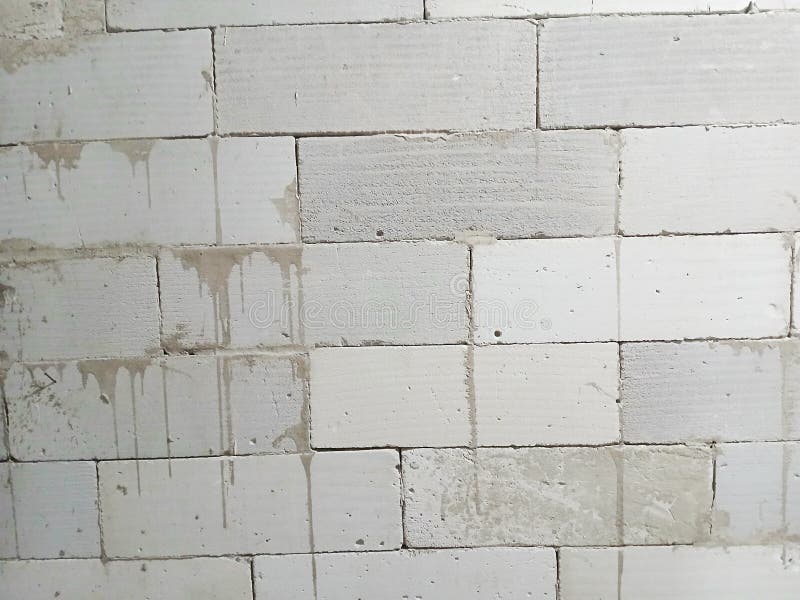 A Wall Made of White Concrete Bricks Arranged in a Rectangular Pattern ...