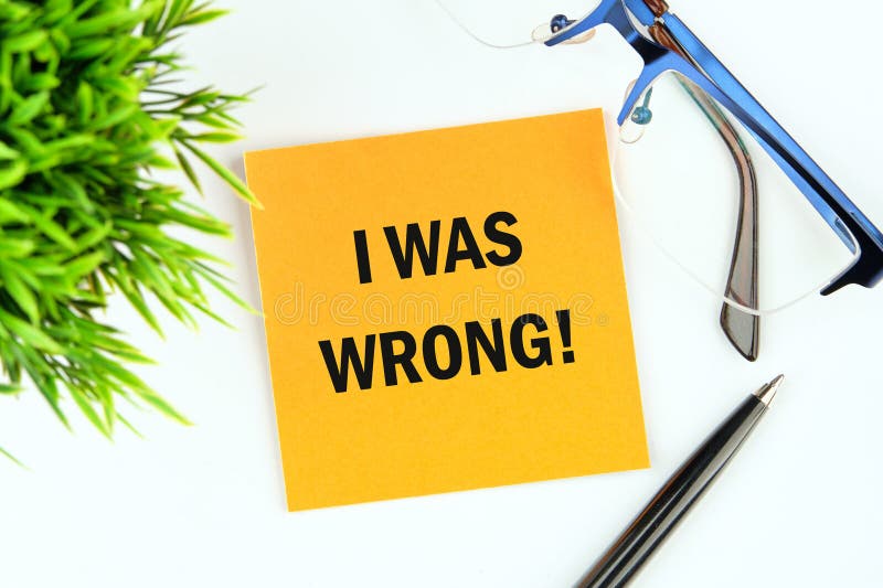 I WAS WRONG Text Written on a Sticker on a White Background, Top View ...