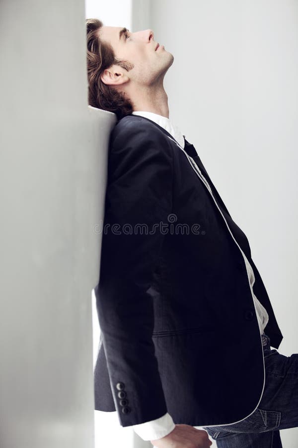 I Wonder What I Can Expect. a Young Man Looking Upward and Thinking ...