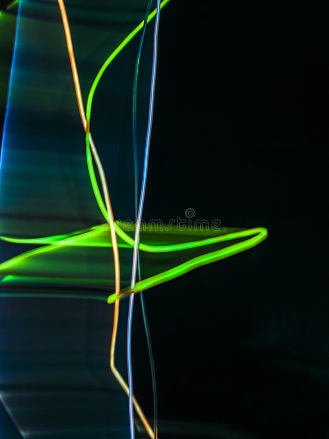 Abstract Moving Neon Lights on Black Background Stock Image - Image of ...