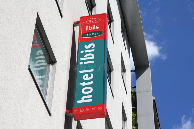 Ibis Hotel Sign on a Pole. Ibis is an International Hotel Company ...