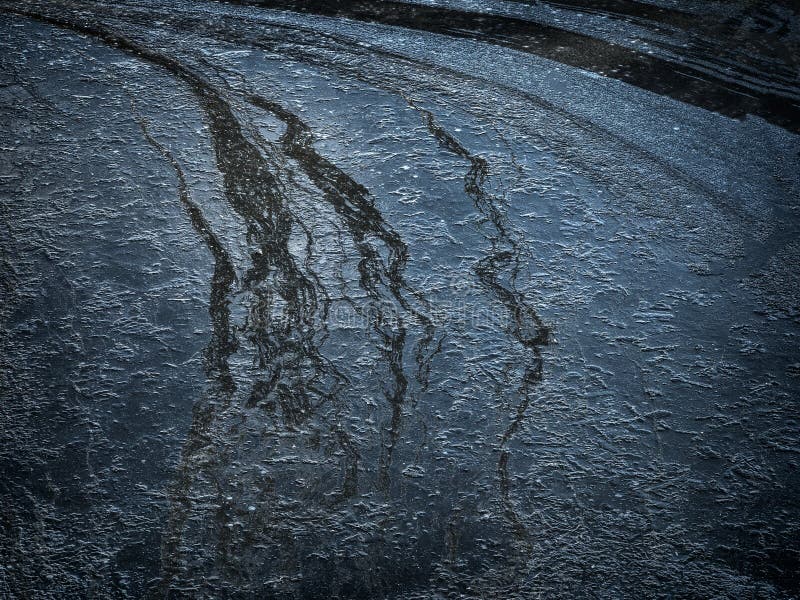 Ice with Abstract Streaks on the Surface. Natural Dark Background with ...