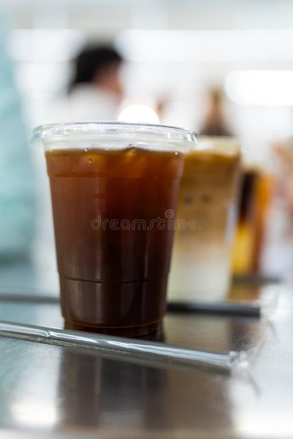 Ice Americano Coffee in a Disposable Glass Stock Photo - Image of ...