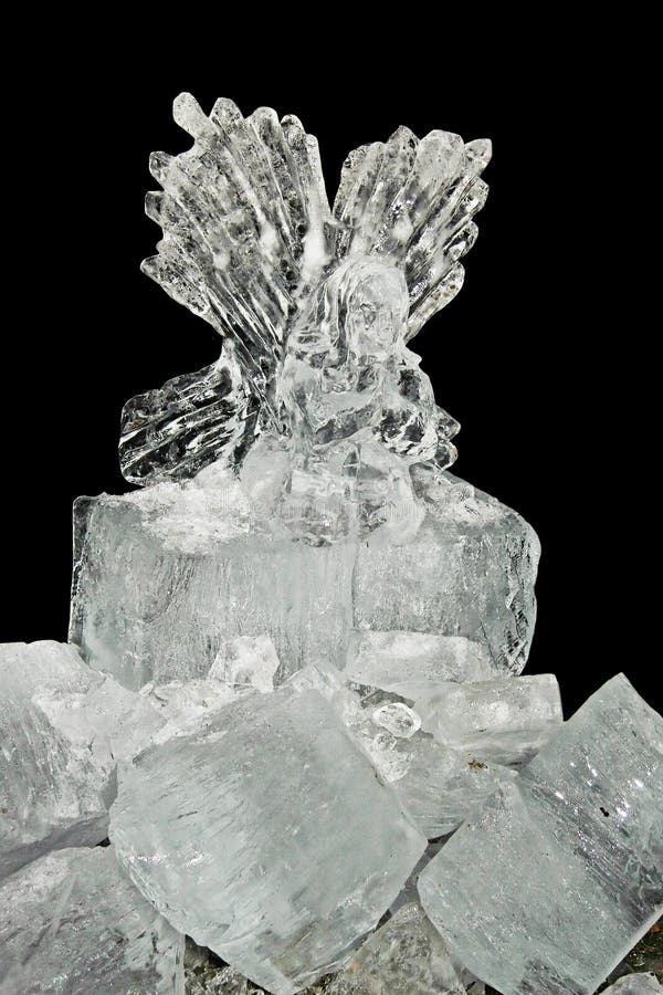 Carved Sculpture Of Frozen Angel In Ice Stock Photo - Image of liquid ...