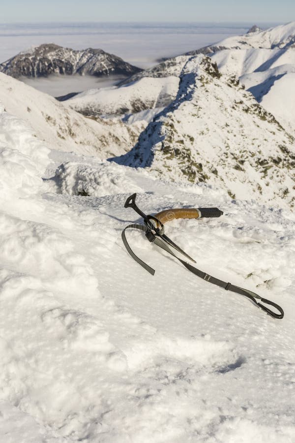 Ice axe in snow stock photo. Image of view, background - 99464816