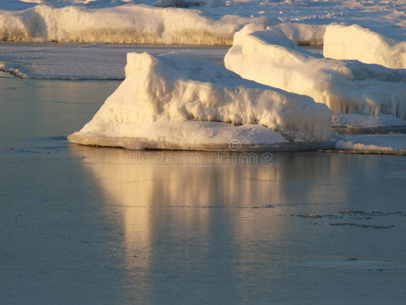 Ice banks on the sea shore stock image. Image of rock - 14355129