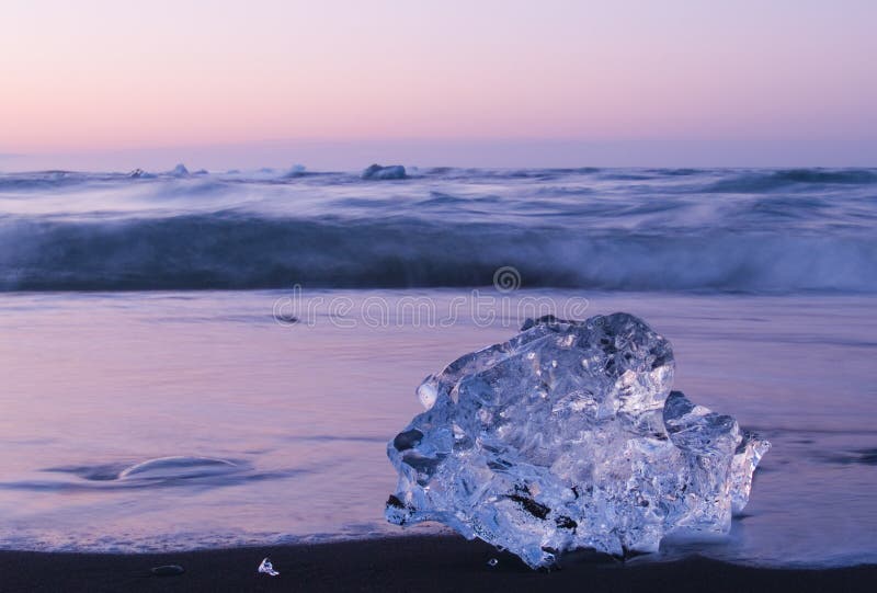 Ice on the beach stock image. Image of clear, black, silver - 7223279