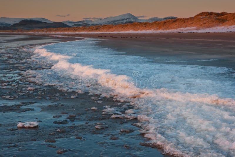 Ice on a beach stock image. Image of winter, wales, snowdon - 56974857