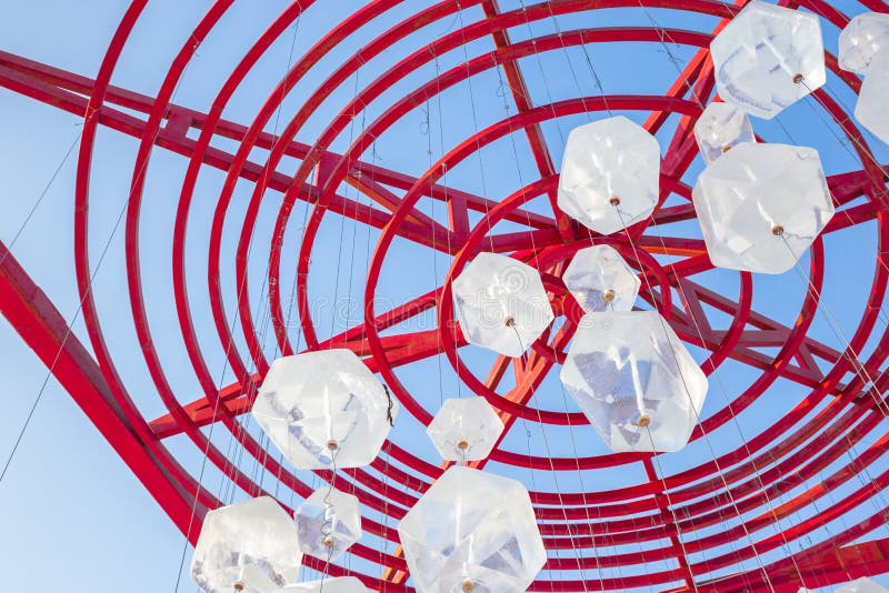 Ice Blocks Hanging from Red Metal Structure Stock Photo - Image of snow ...