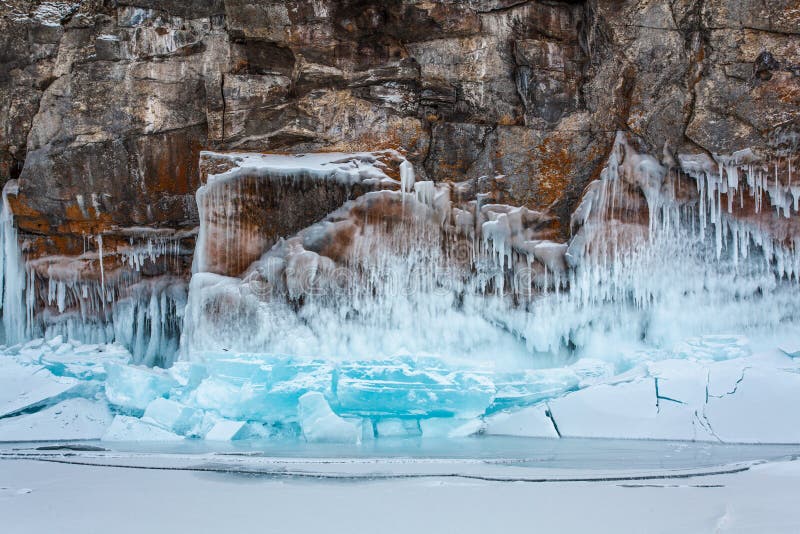 Ice blocks and rock stock photo. Image of season, white - 66732904