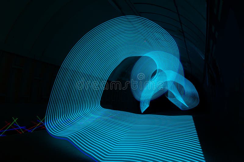 Ice Blue LED Light Creating a Swirl Pattern in a Dark Tunnel. Stock ...
