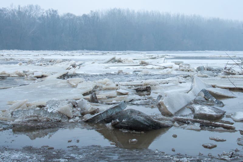 Ice breaking on the lake stock image. Image of river - 136957839
