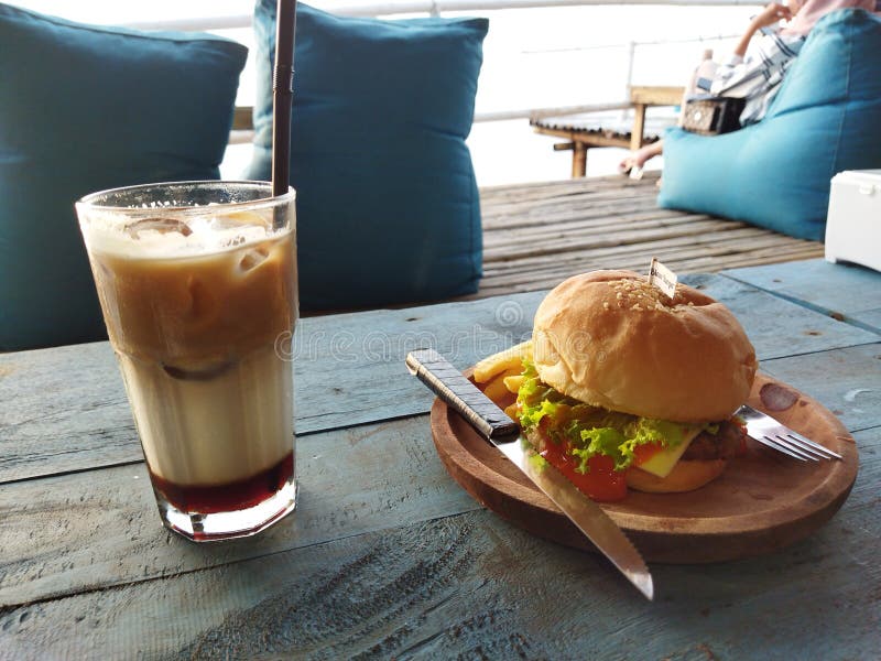 Ice Brewed Coffee at a Beachside Cafe at Sunset Stock Photo - Image of ...