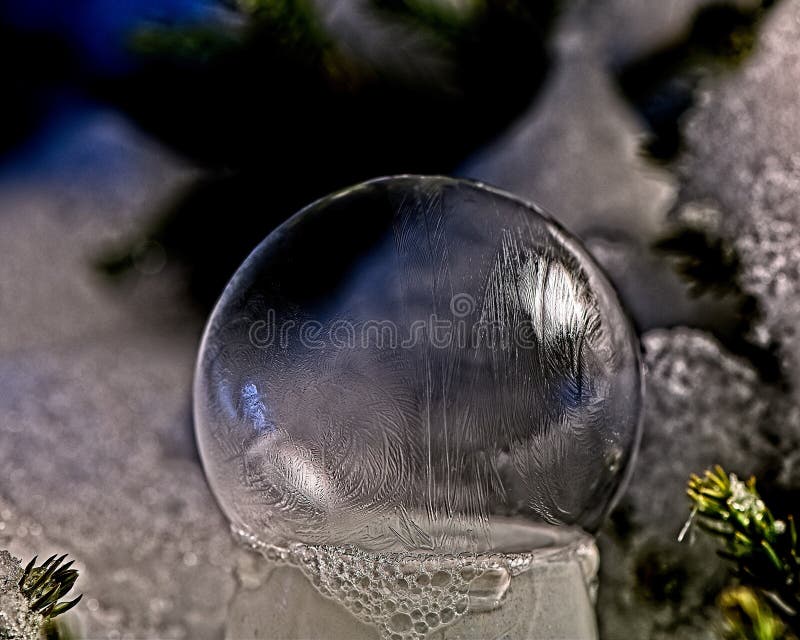 Ice Bubbles with Crystals Forming on a Black Background Stock Photo ...