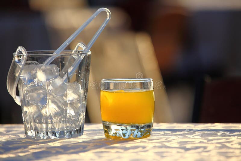 Ice Bucket and Glass of Juice Stock Image - Image of juice, bucket: 9372417
