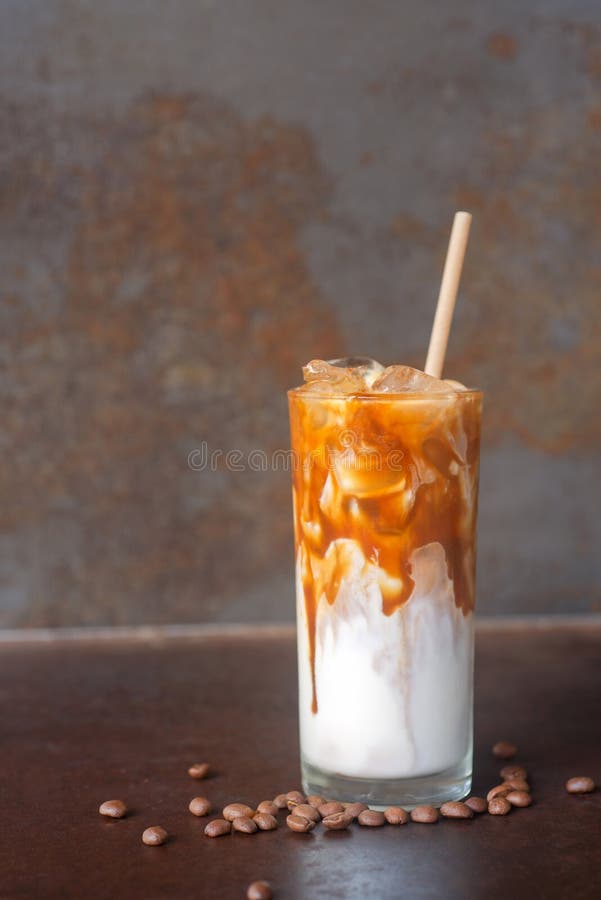 Ice Caramel Macchiato Coffee on Rustic Table Background Stock Image ...