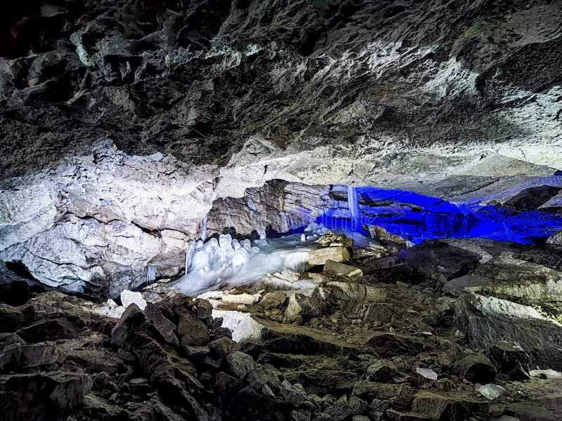 Ice in Cave, Illuminated by Artificial Lighting, with Large Differences ...