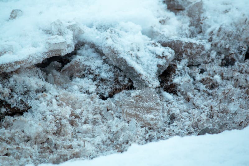 Ice Chunks from a Frozen Mud Puddle Stock Photo - Image of chilly, snow ...