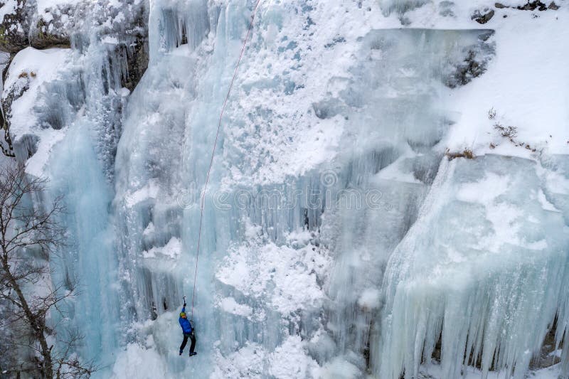 Ice Climbing the North Greece, Man Climbing Frozen Waterfall Editorial ...
