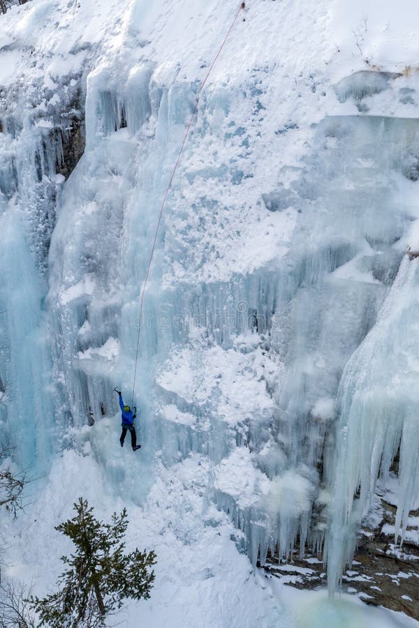 Ice Climbing the North Greece, Man Climbing Frozen Waterfall Editorial ...
