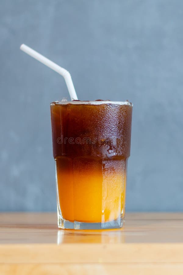 Ice Coffee, Americano Coffee with Orange in Cafe Stock Photo - Image of ...