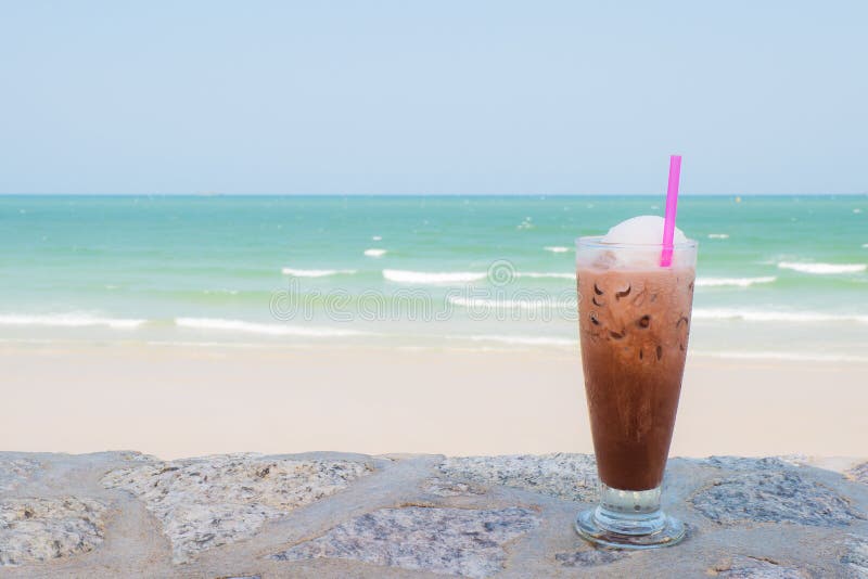 Coffee on the beach stock photo. Image of outdoor, ocean - 19650618