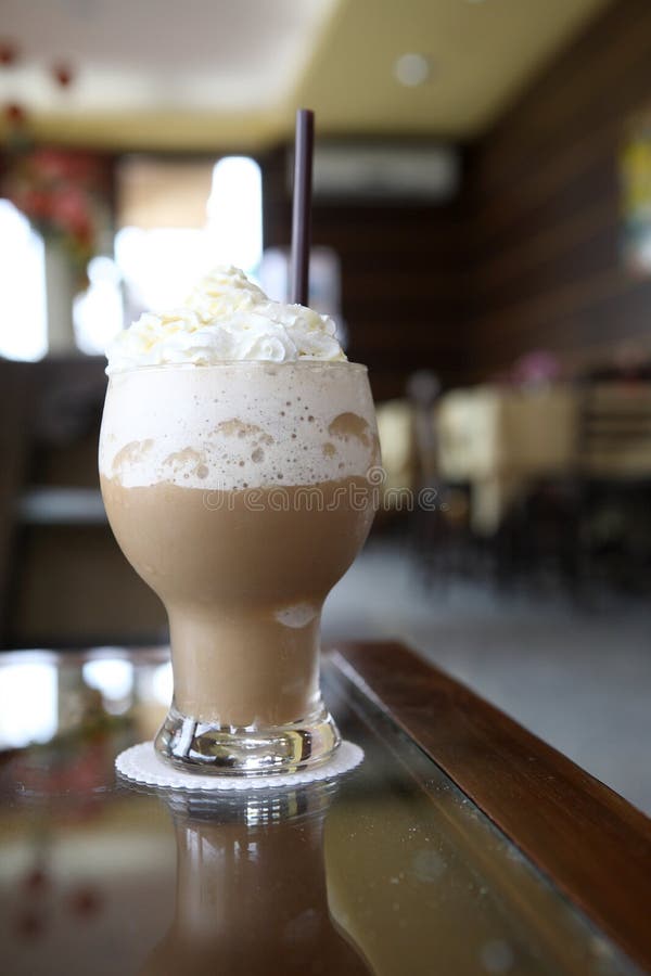 Ice coffee in coffee shop stock image. Image of froth - 19616971