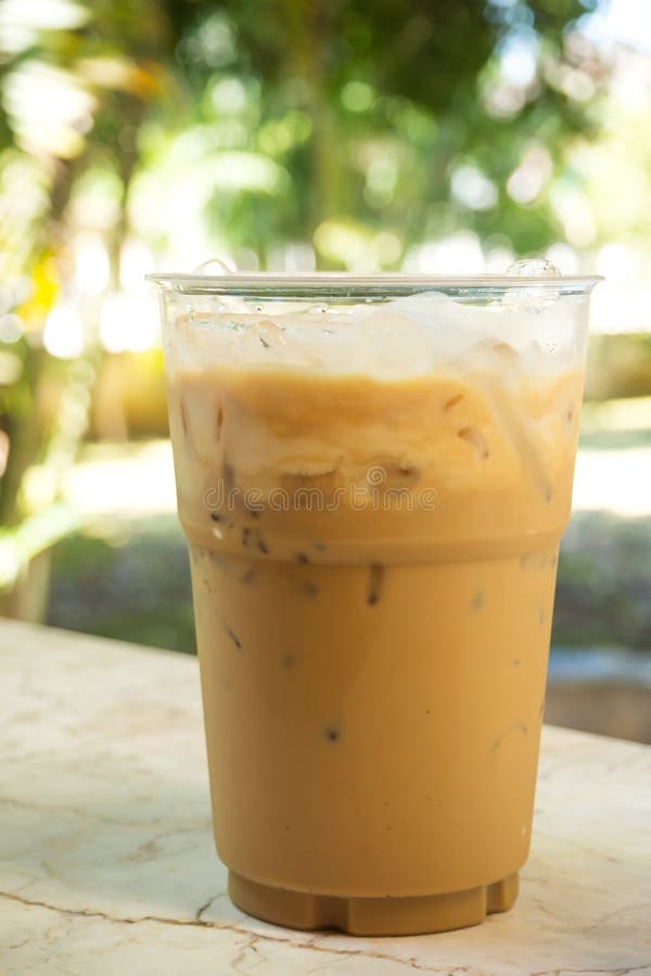 Ice coffee in plastic cup. stock photo. Image of glass - 81660174