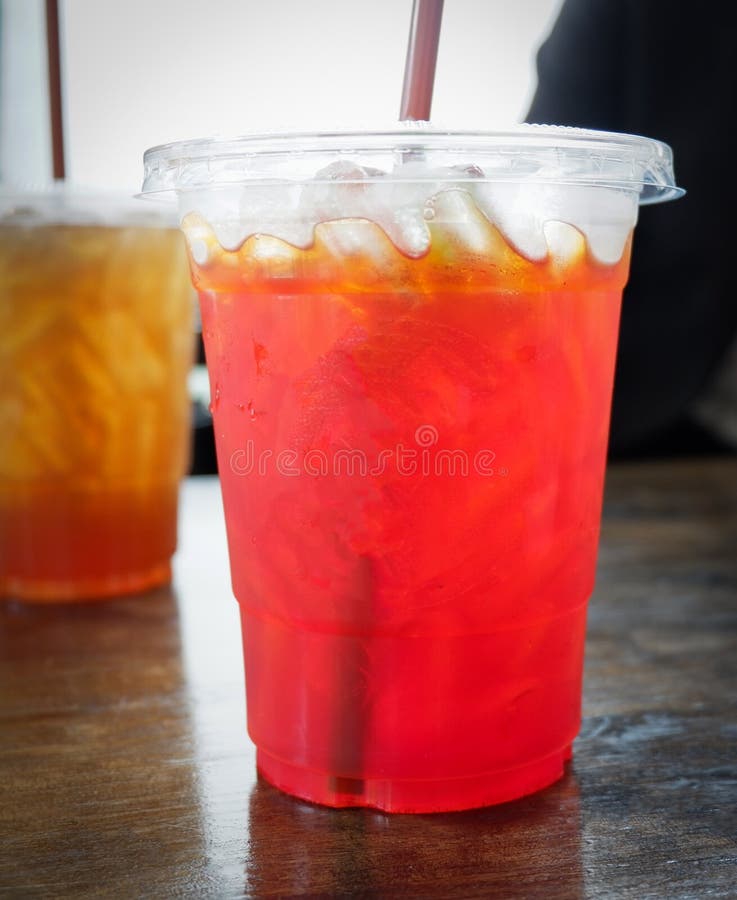 Juice plastic cup stock image. Image of brown, glass - 101787873