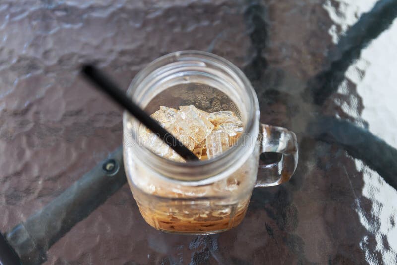 Ice coffee on the table stock image. Image of coffee - 66718635