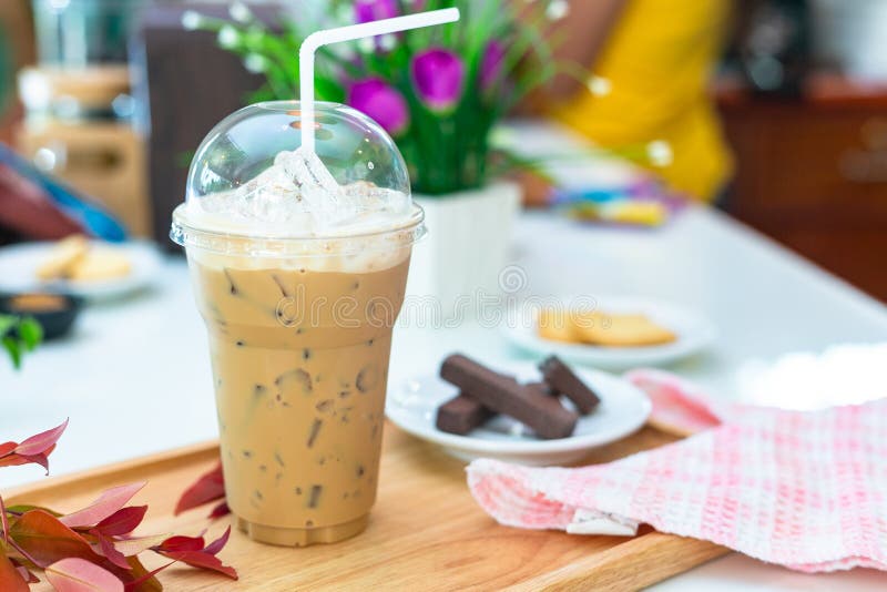 Ice Coffee on a Wood Table with Dessert Refreshing Look of the Drink ...