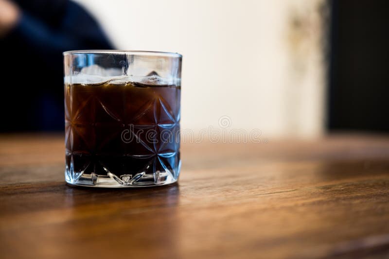 Ice Cold Brew Coffee in Glass on Wood Table Stock Image - Image of iced ...
