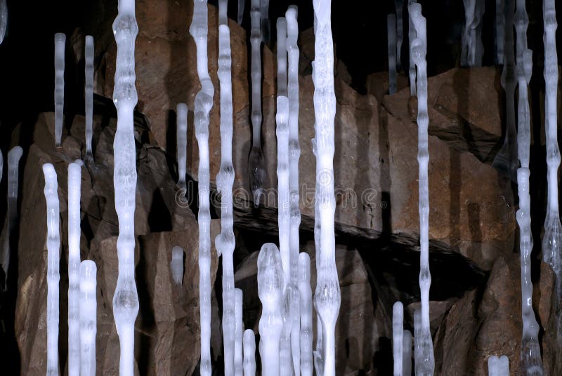 Ice columns in a cave stock image. Image of formations - 110138667