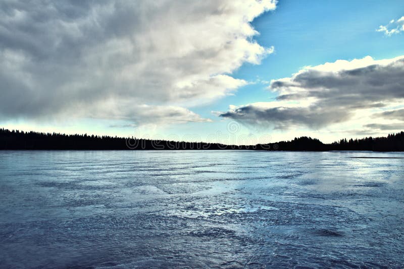 Winter lake covered in ice stock image. Image of scenic - 109449749