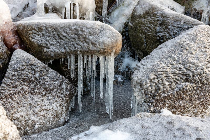 Ice-covered Rocks. Frozen Lakeside. Stock Photo - Image of blue, frost ...