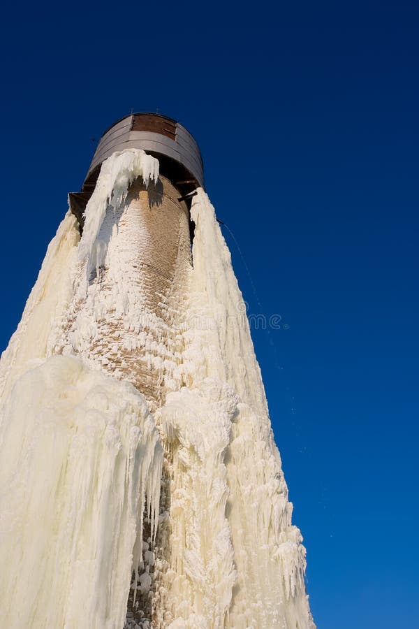 Ice-covered water tower stock photo. Image of icicle - 14079572