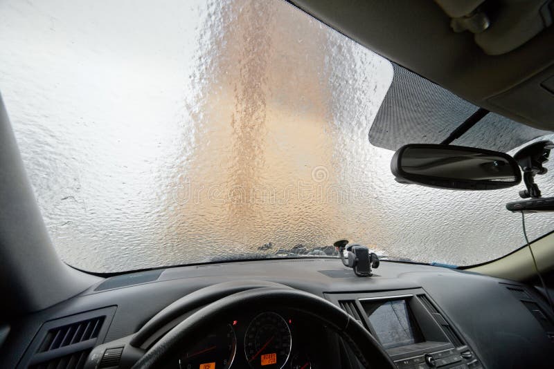 Ice Covered Windshield Looking From Inside Out Stock Photo - Image of ...