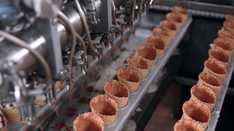 Ice-cream Automatic Production Line. Filling of Wafer Cups with Ice ...