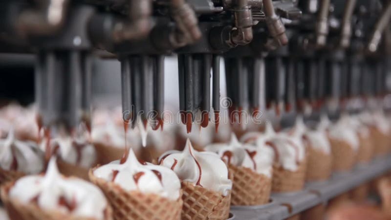 Ice-cream Automatic Production Line. Filling of Wafer Cups with Ice ...