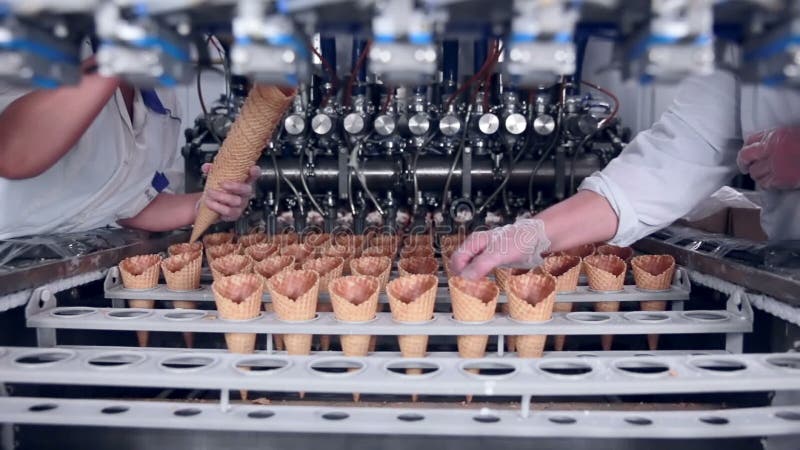 Ice-cream Automatic Production Line. Filling of Wafer Cups with Ice ...