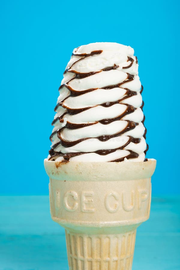Ice Cream Cone on a Blue Background at Vertical Composition Stock Image ...